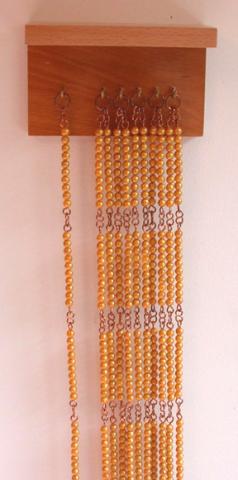Golden Bead Chains of 100 and 1000 with Wall Frame | E&O Montessori